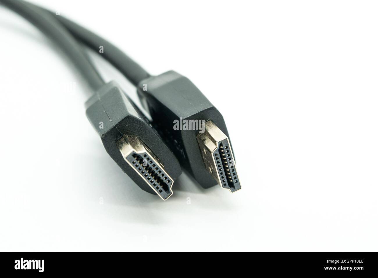 Close-up view of HDMI cables on a white background Stock Photo - Alamy