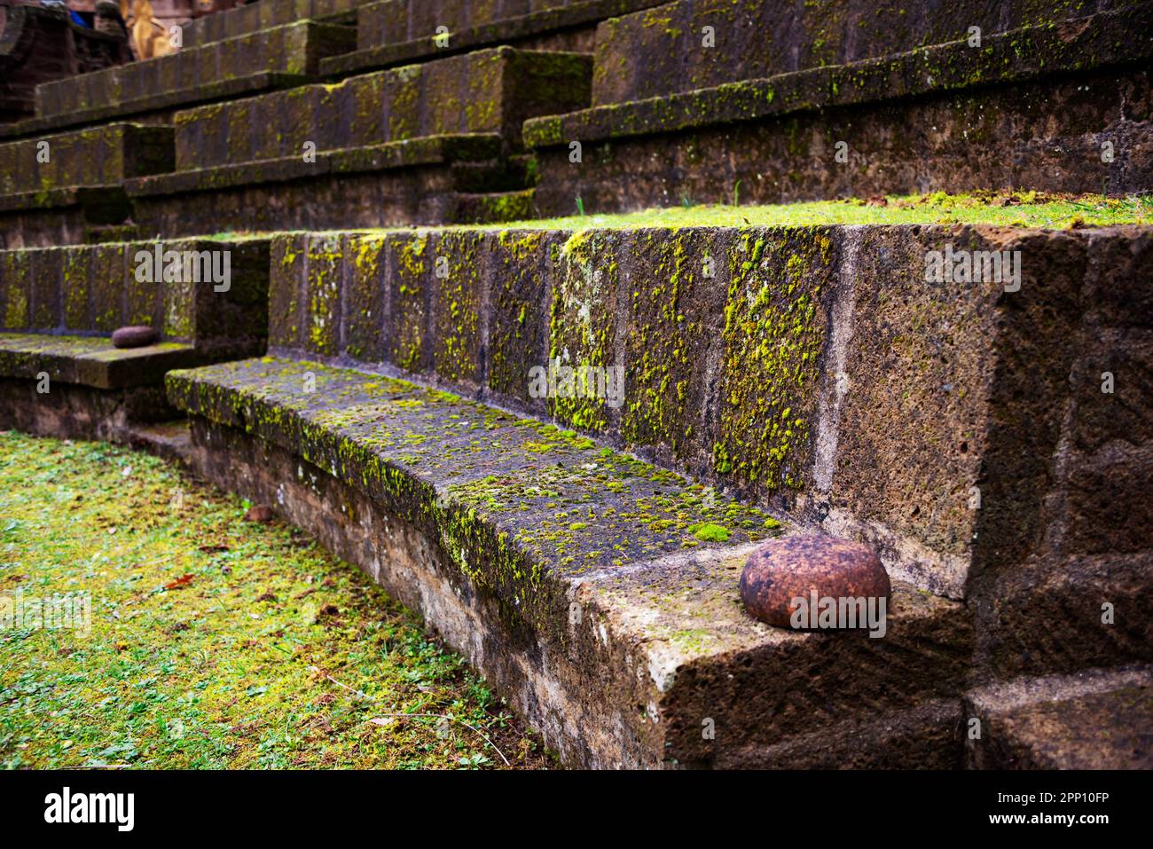 Old stone construction covered with moss Stock Photo - Alamy