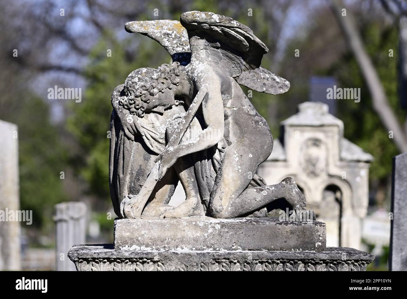 Vienna, Austria. Vienna Central Cemetery. Old weathered stone statue at ...
