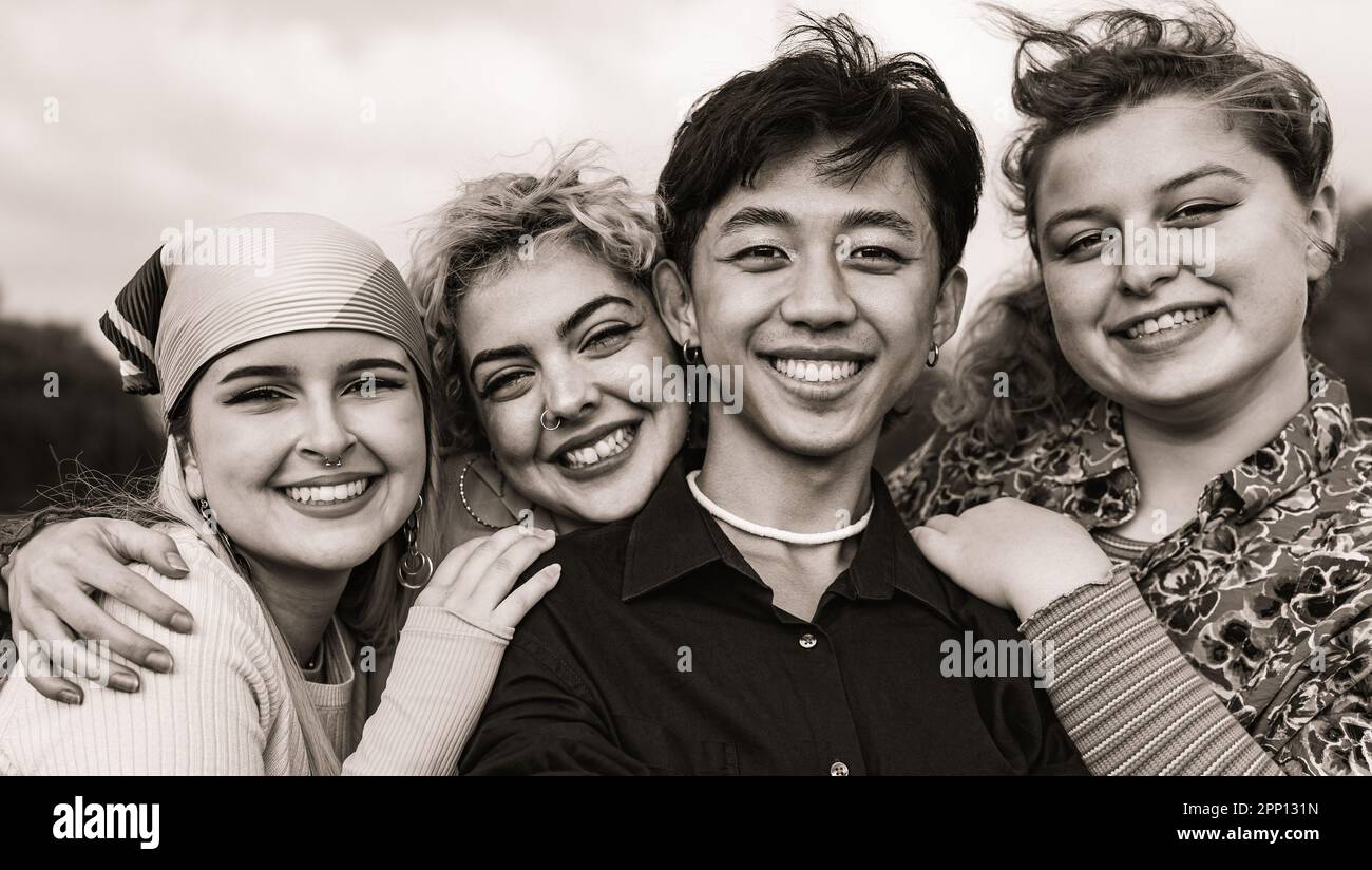 Happy young diverse friends having fun hanging out together - Youth people millennial generation ...