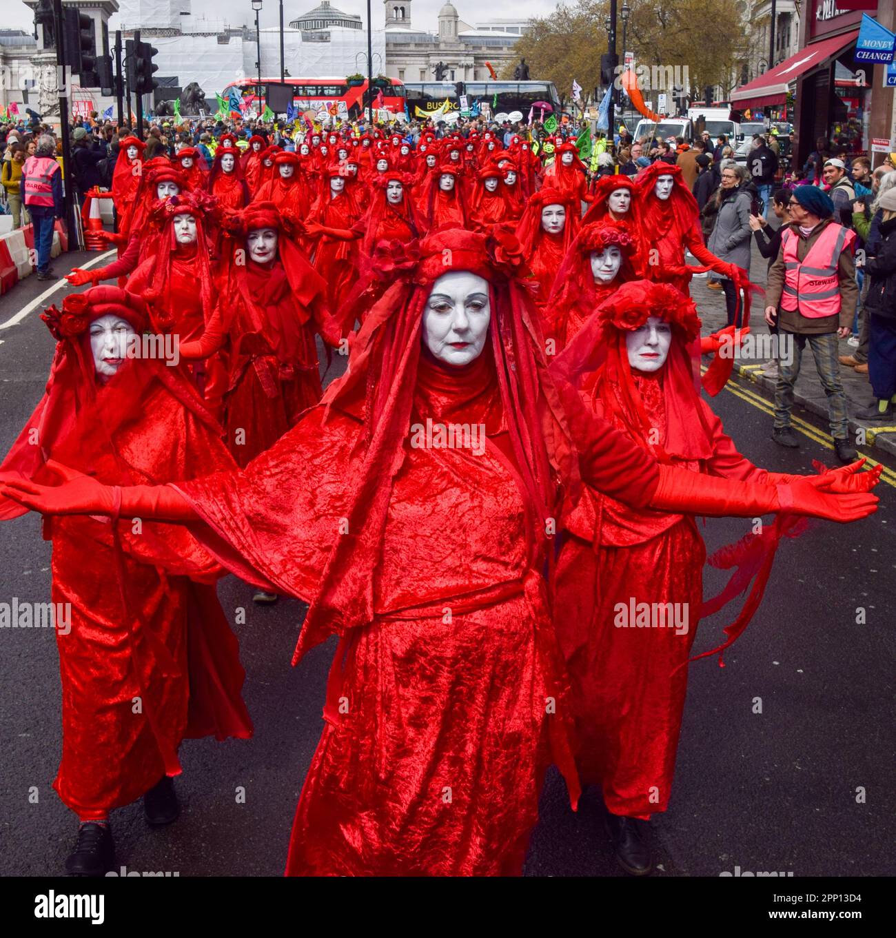 London, UK. 21st April 2023. Red Rebels pass through Whitehall as ...
