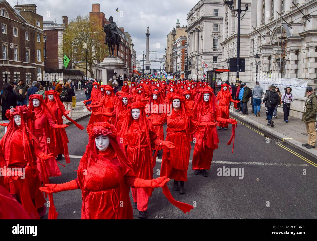 London, UK. 21st April 2023. Red Rebels pass through Whitehall as ...