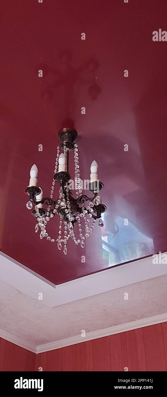 Light bulbs hang on ceiling hi-res stock photography and images - Alamy