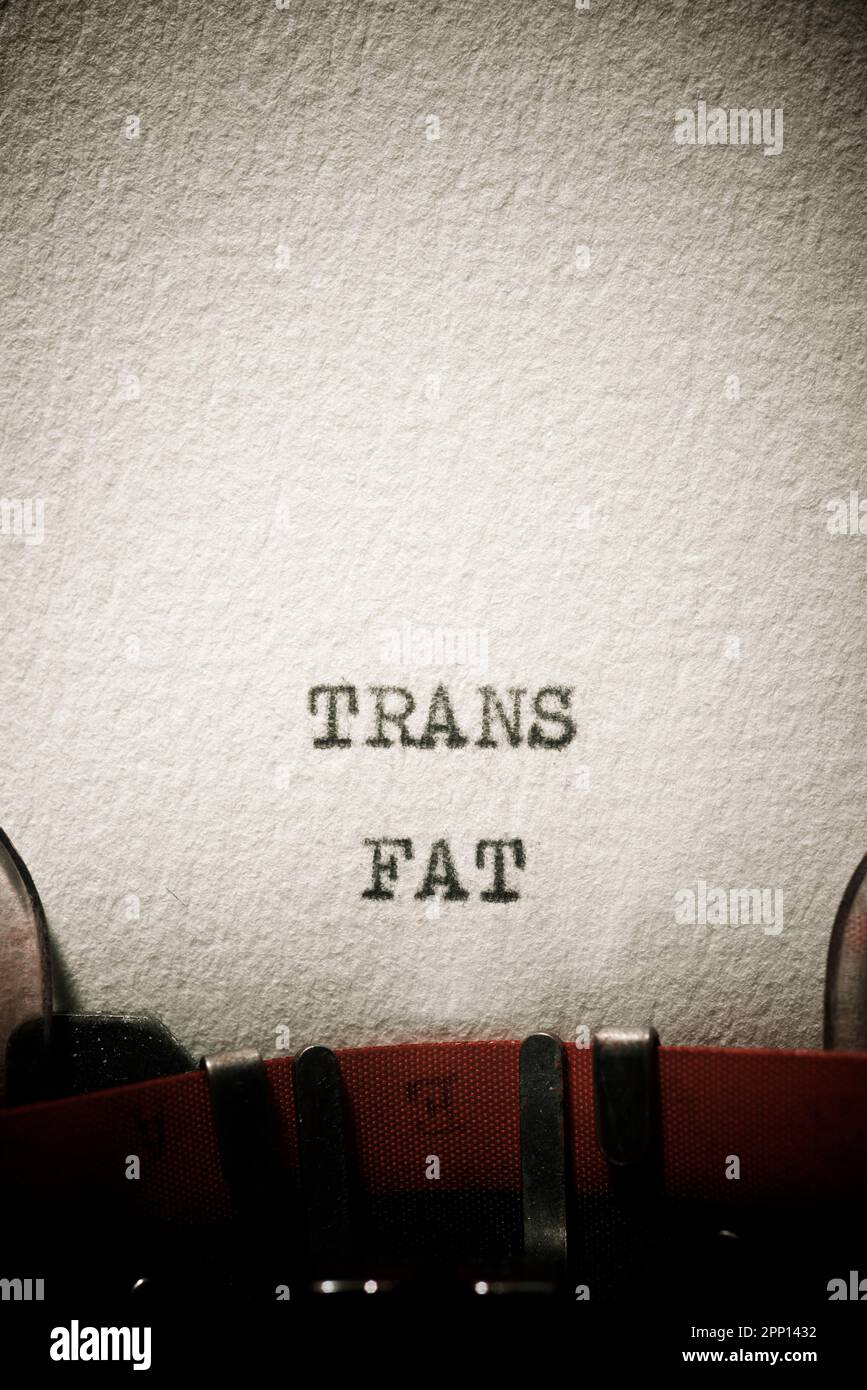Trans fat text written with a typewriter Stock Photo - Alamy