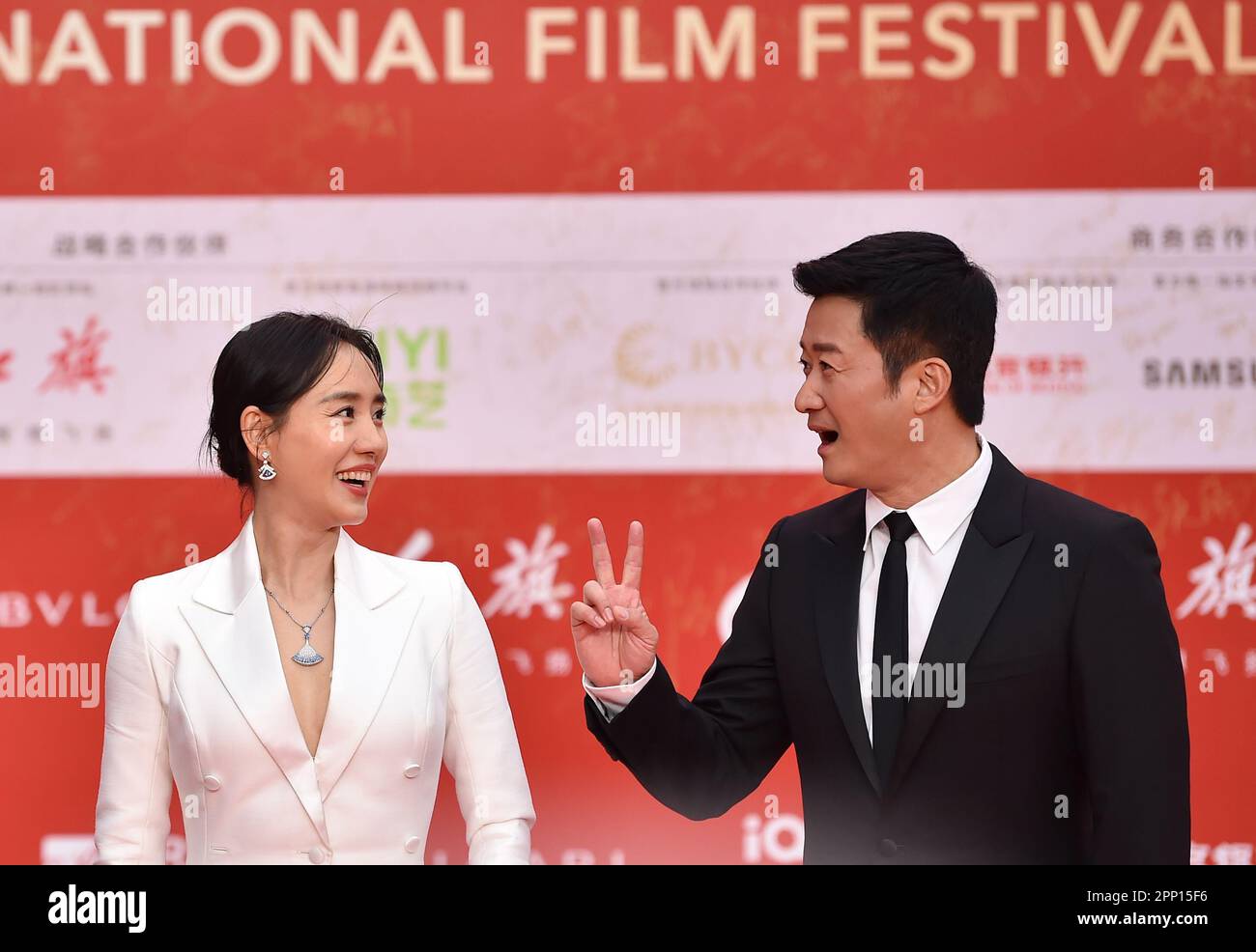 Beijing, China. 21st Apr, 2023. Cast members of the film "The Wandering Earth II" Wang Zhi (L ...