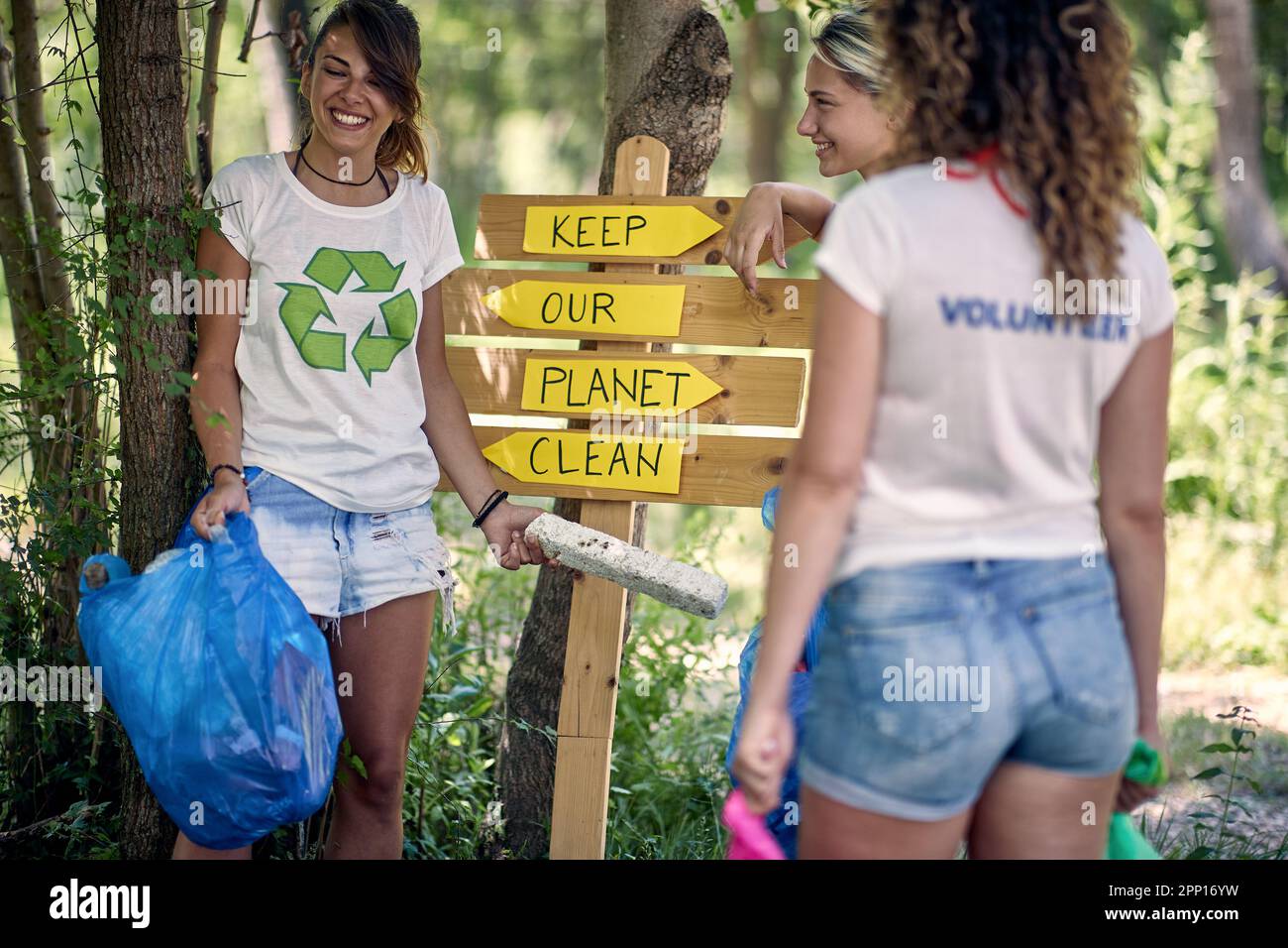 Team of young volunteers caring for nature, picking up plastic garbage ... Team of young volunteers caring for nature, picking up plastic garbage ...
