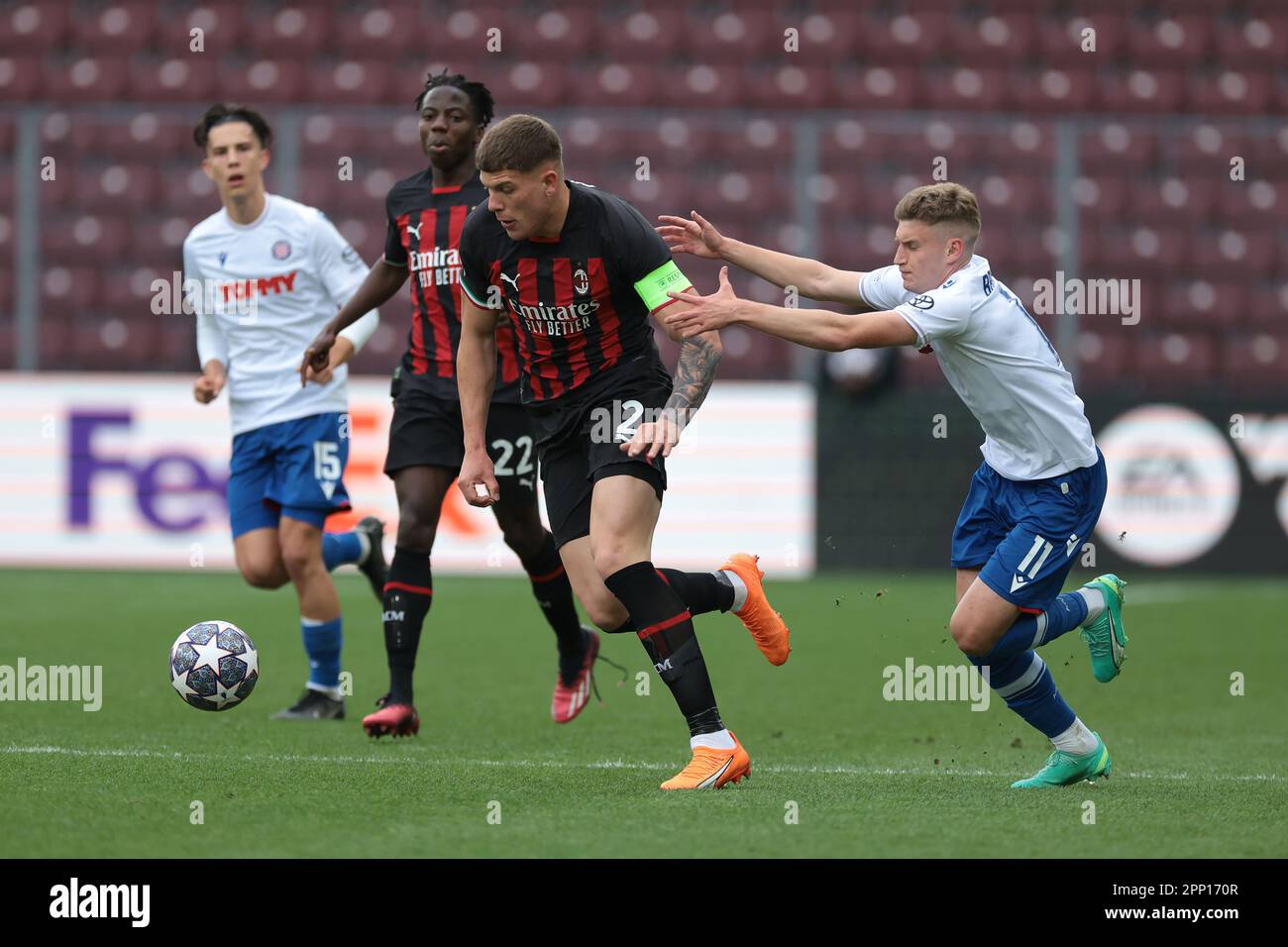 Geneva, Switzerland, 21st April 2023. Andrei Coubis of AC Milan breaks ...