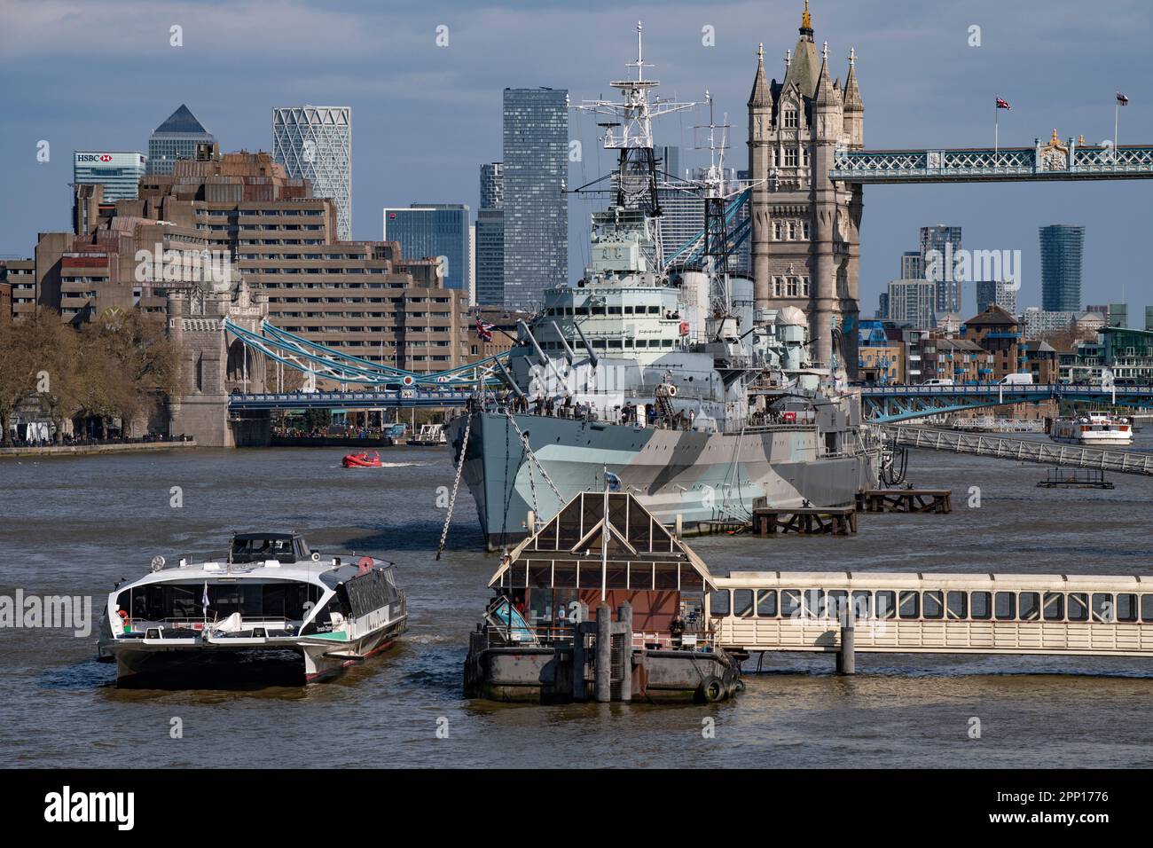 London HMS Belfast on the River Thames with Tower Bridge in background ...