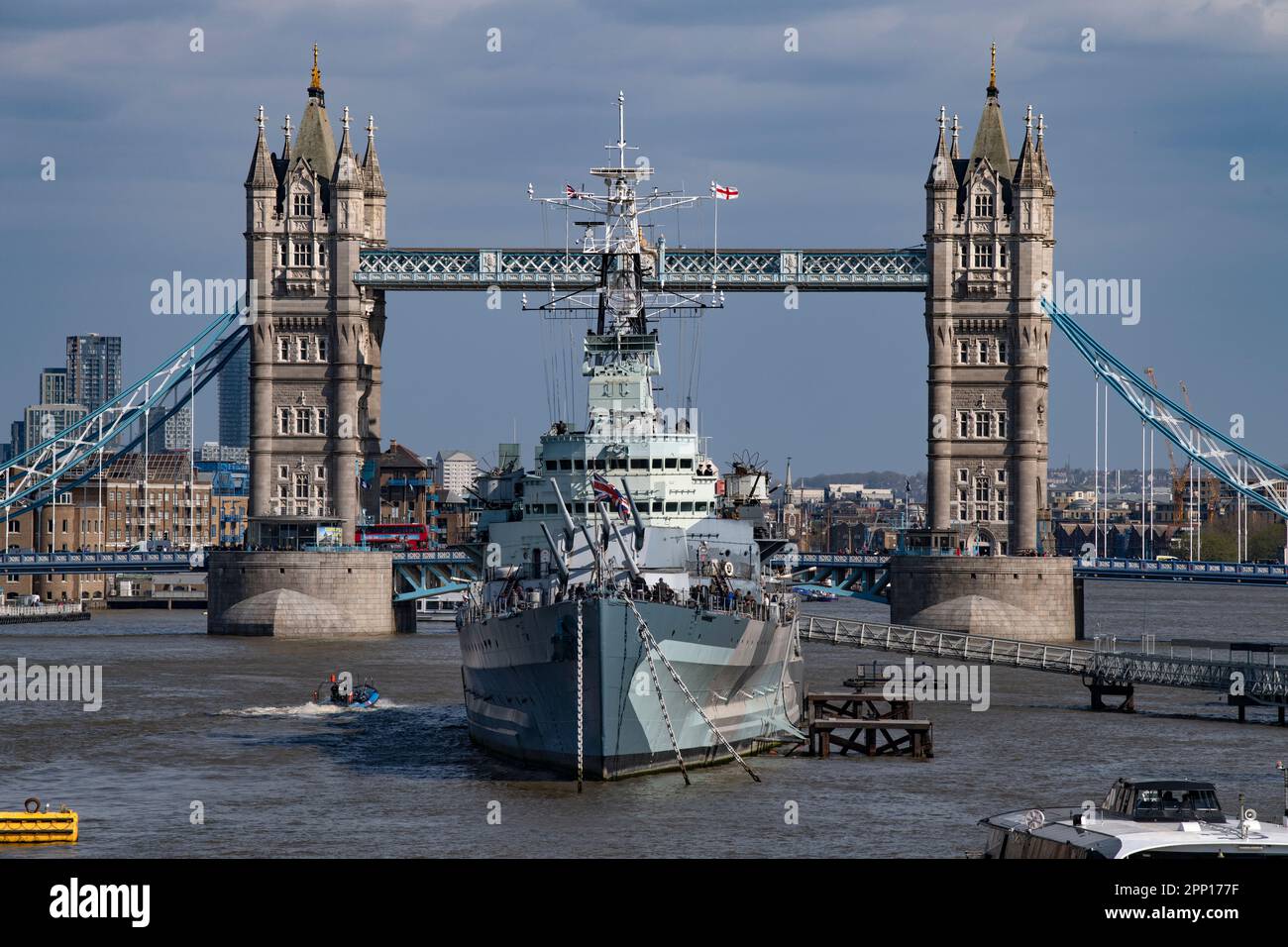 London HMS Belfast on the River Thames with Tower Bridge in background ...