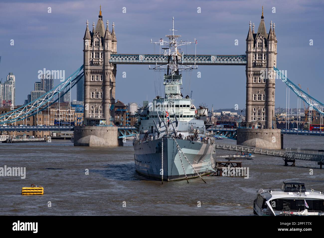 London HMS Belfast on the River Thames with Tower Bridge in background ...