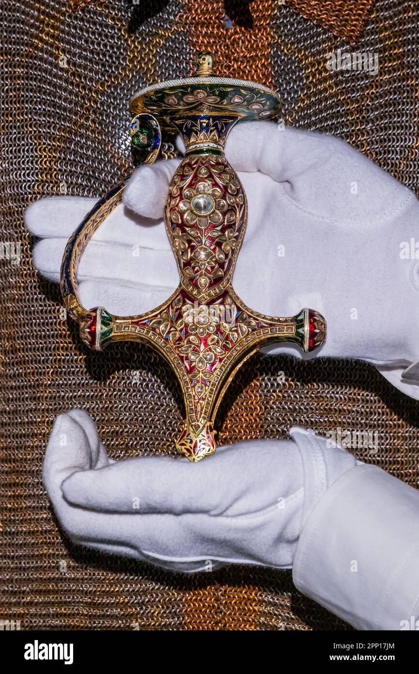 London, UK. 21st Apr, 2023. An Enamelled And Gem-Set Gold Tulwar Hilt ...