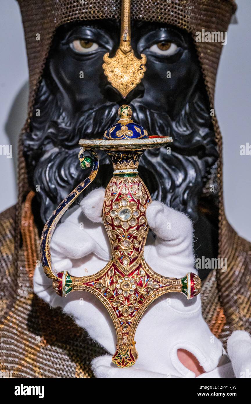 London, UK. 21st Apr, 2023. An Enamelled And Gem-Set Gold Tulwar Hilt ...