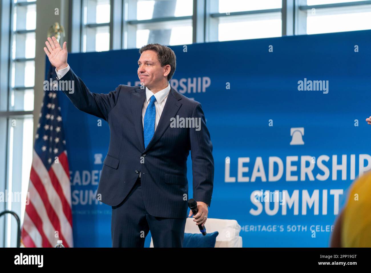 Florida Gov. Ron DeSantis waves after speaking at the Heritage ...