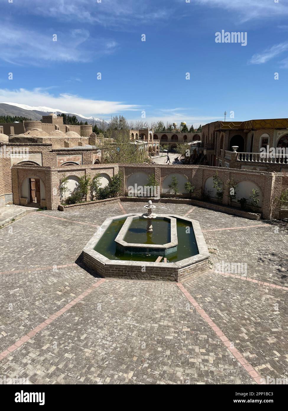 Courtyard fountain trees surrounded hi-res stock photography and images ...