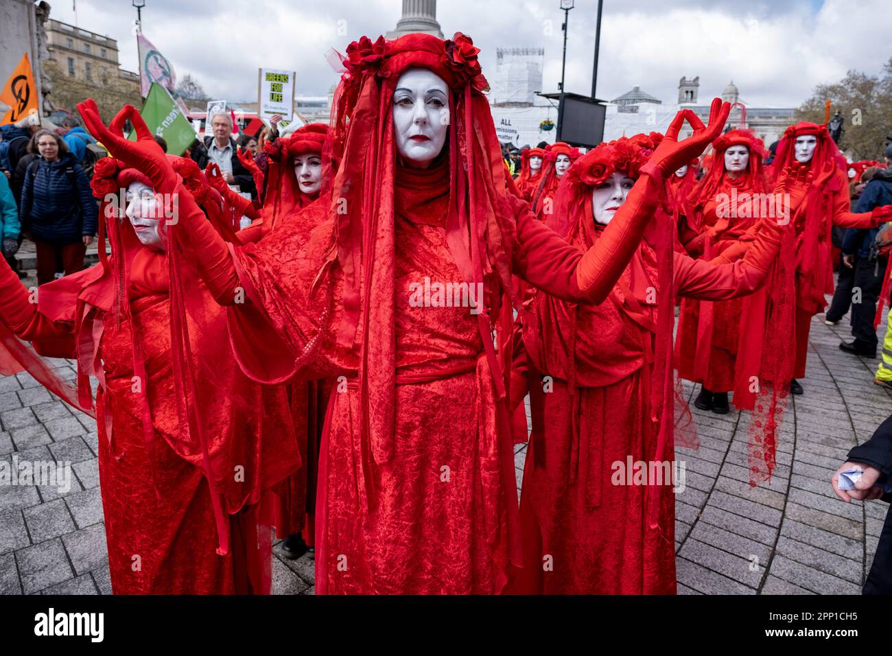 Activist performance art troupe the Red Rebel Brigade wearing bright ...