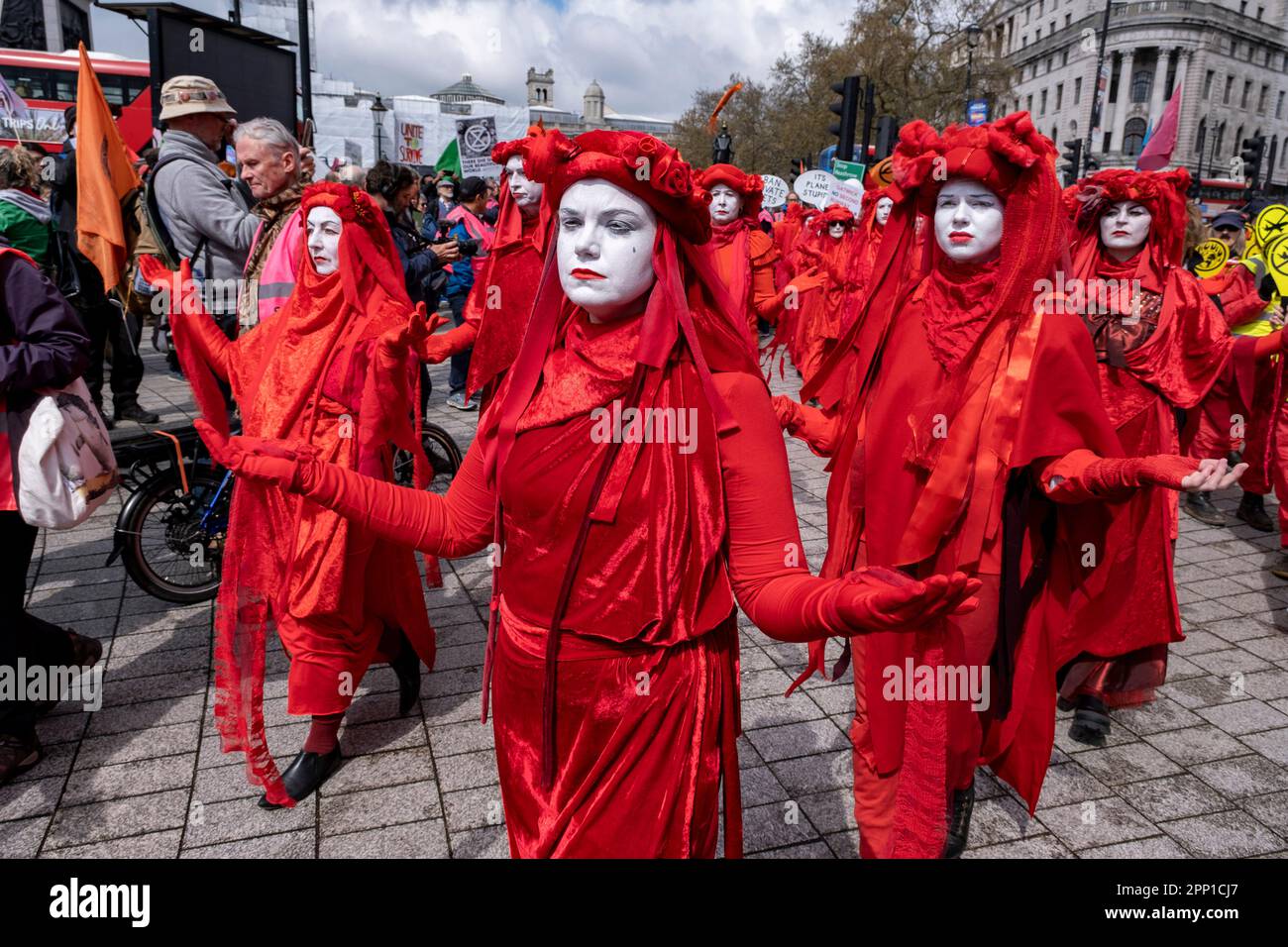 Activist performance art troupe the Red Rebel Brigade wearing bright ...
