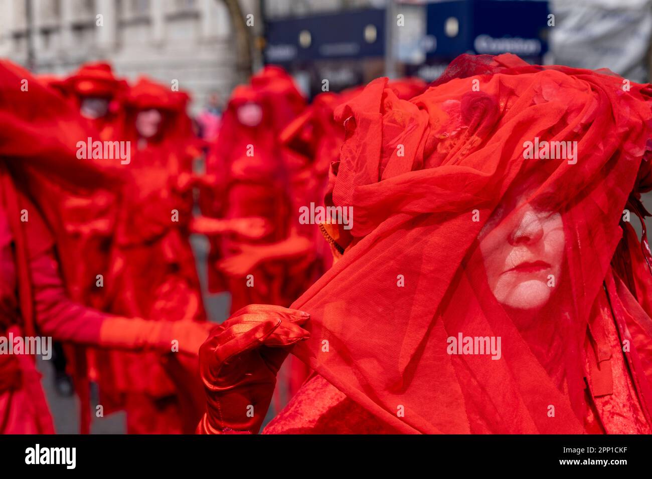 Activist performance art troupe the Red Rebel Brigade wearing bright ...