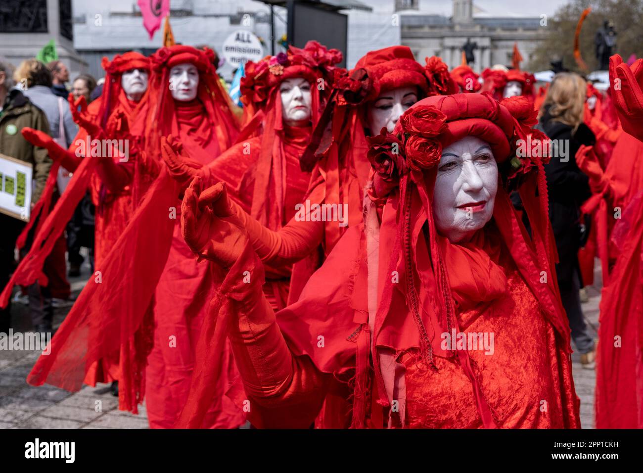 Activist performance art troupe the Red Rebel Brigade wearing bright ...