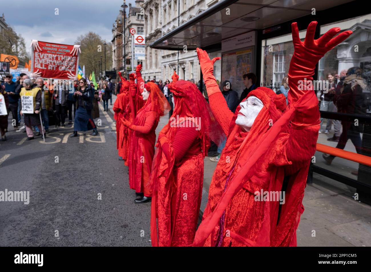 Activist performance art troupe the Red Rebel Brigade wearing bright ...