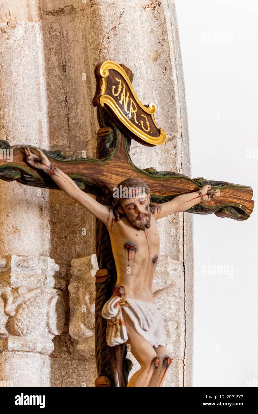 Small wooden painted figurine of Jesus Christ inside a Catholic ...