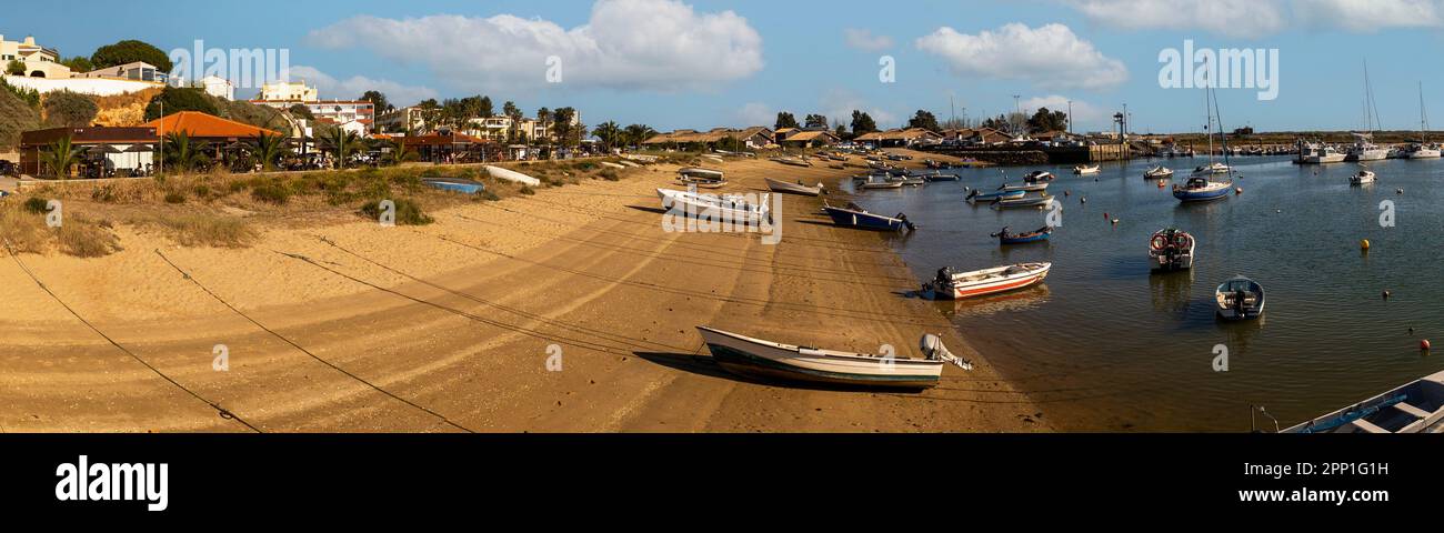 Beautiful Portuguese traditional fishing boats in the marina of Alvor ...