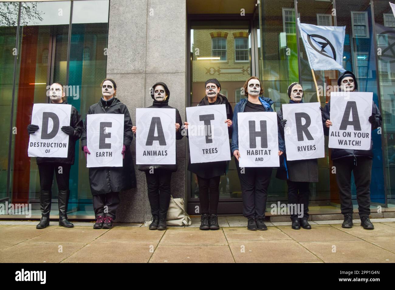 London, UK. 21st April 2023. Protesters stand outside Defra as ...
