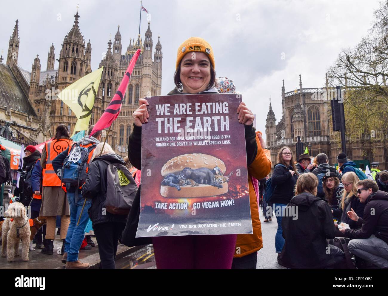 London, UK. 21st April 2023. A protester in Parliament Square holds a ...