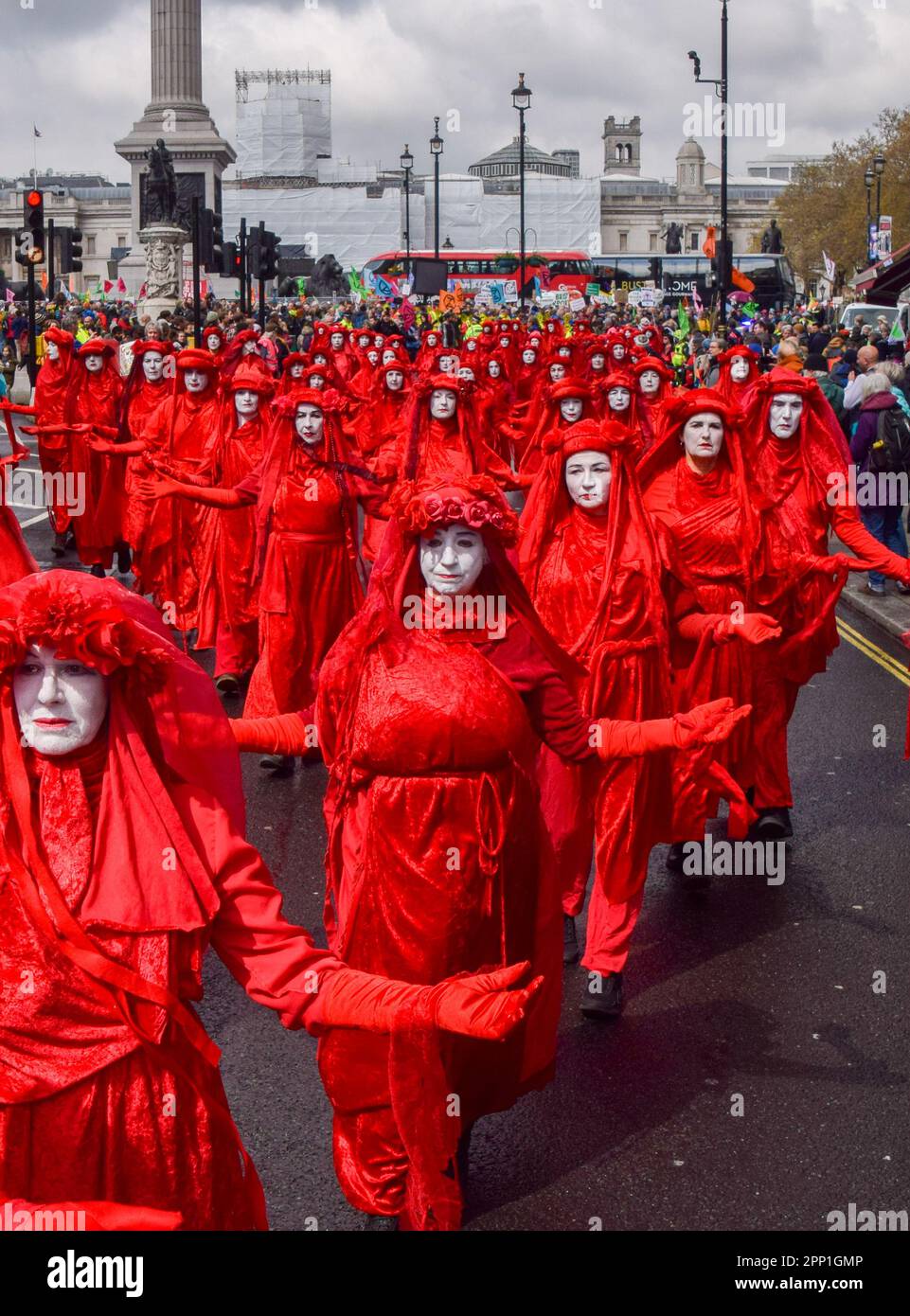 London, UK. 21st April 2023. Red Rebels pass through Trafalgar Square ...