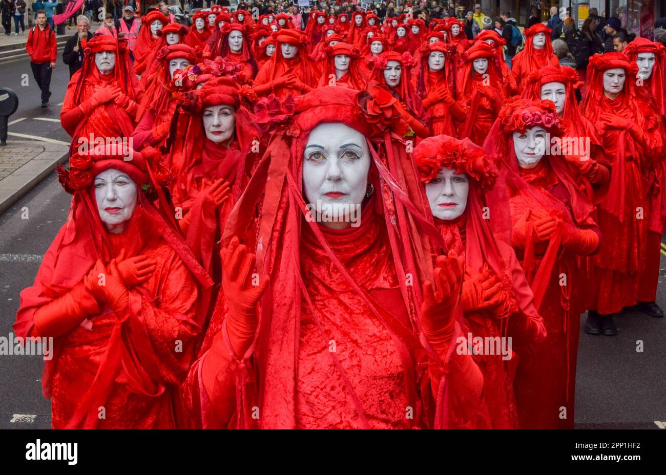 London, UK. 21st April 2023. Red Rebels pass through Whitehall as ...