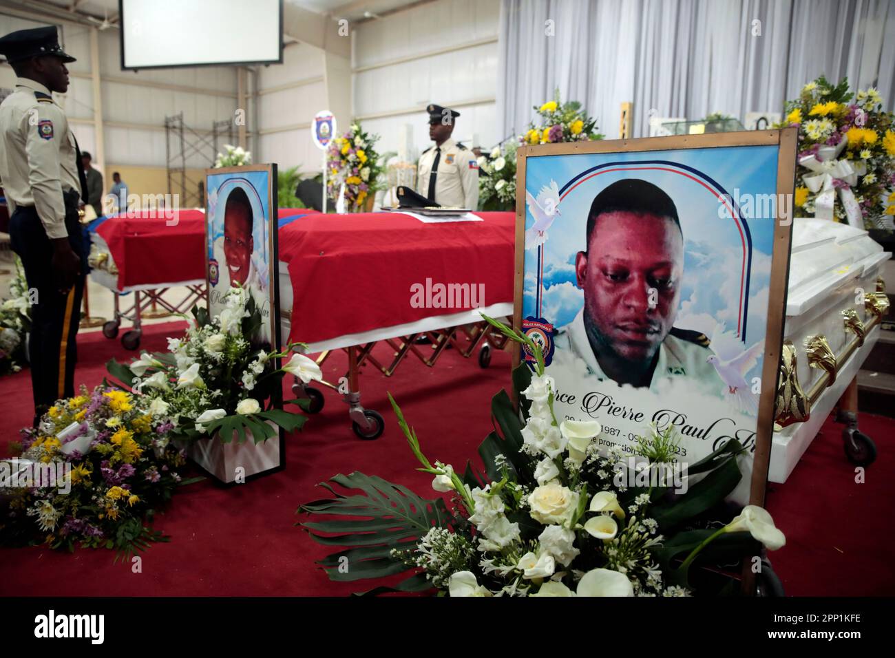 The photos of three police officers who died in the line of duty stand ...