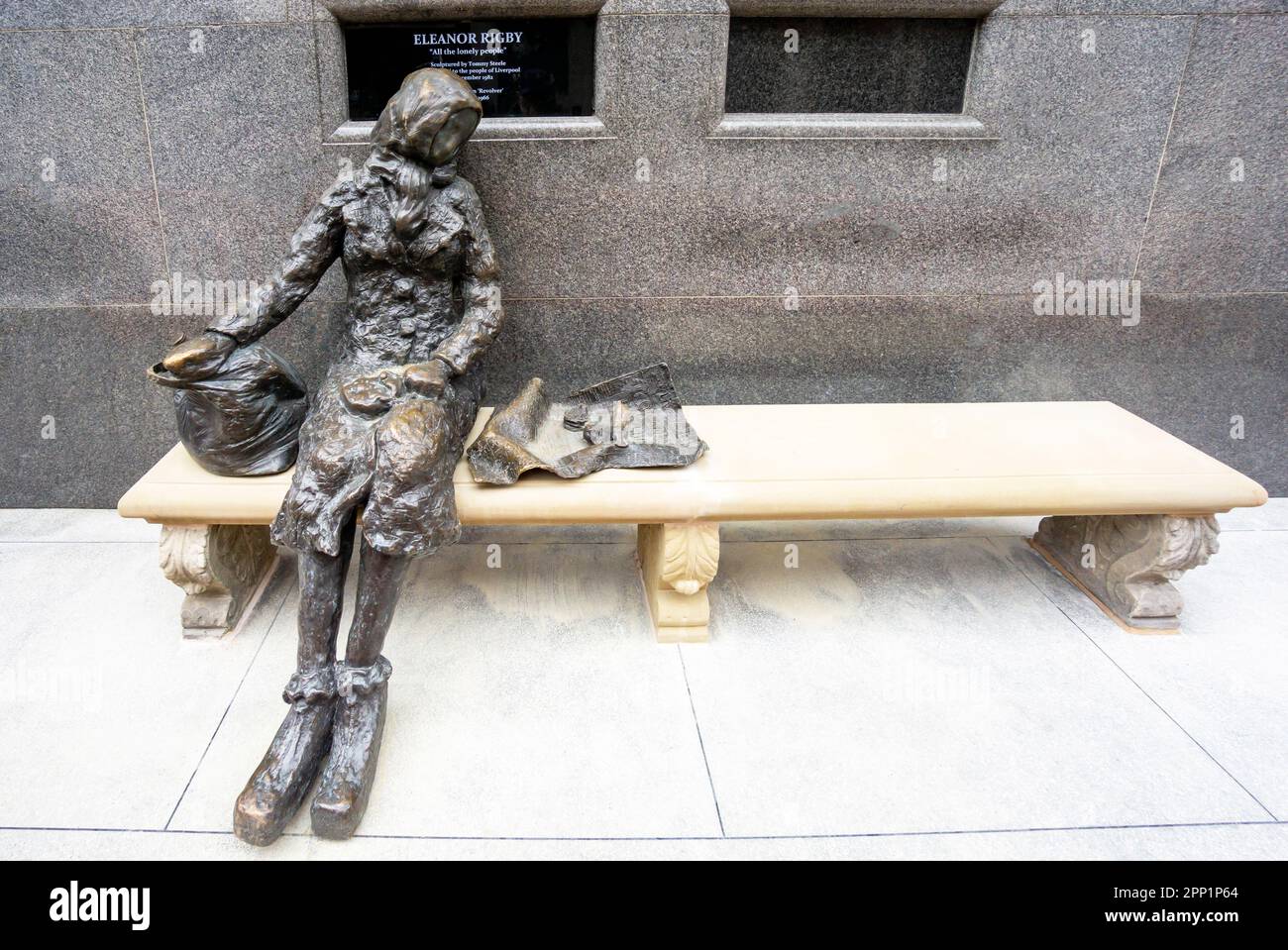Eleanor Rigby statue in Liverpool restored on a new stone bench Stock ...