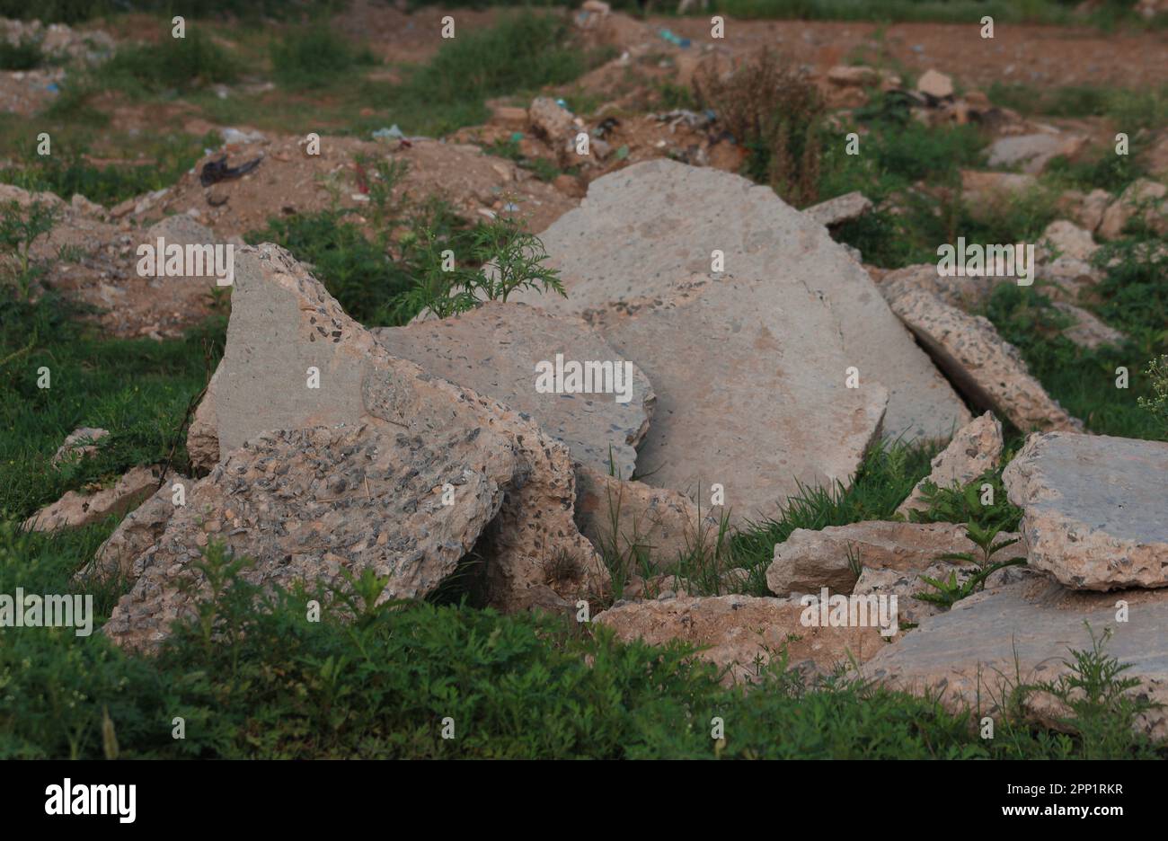 house broke stone in ground Stock Photo - Alamy