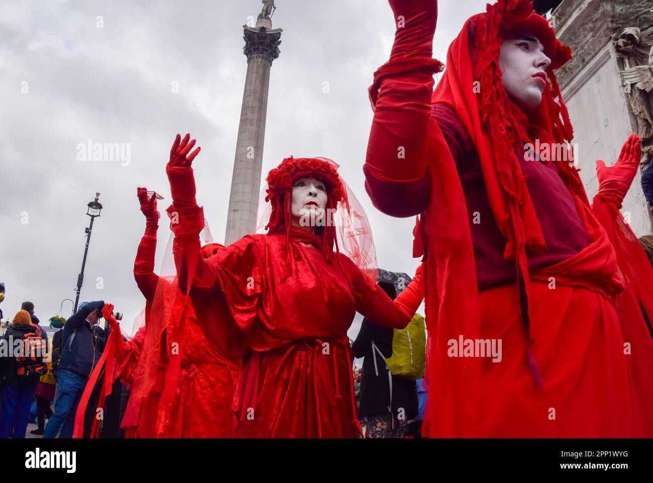 London, UK. 21st April 2023. Red Rebels pass through Whitehall as ...