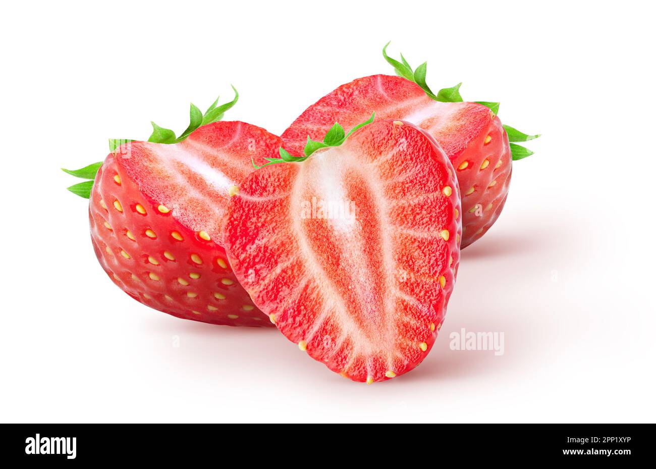 Isolated strawberries. Three cut strawberry fruits isolated on white ...
