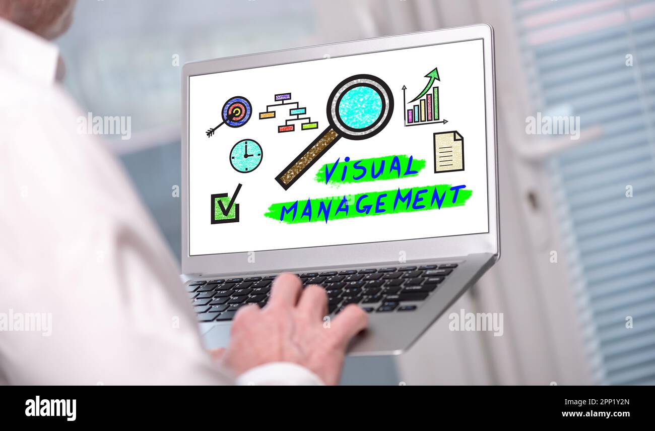 Visual management concept shown on a laptop used by a man Stock Photo ...