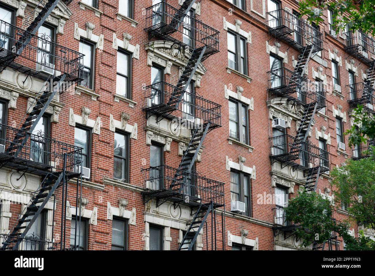 USA, New York City, red old brick building with fire escape Stock Photo ...