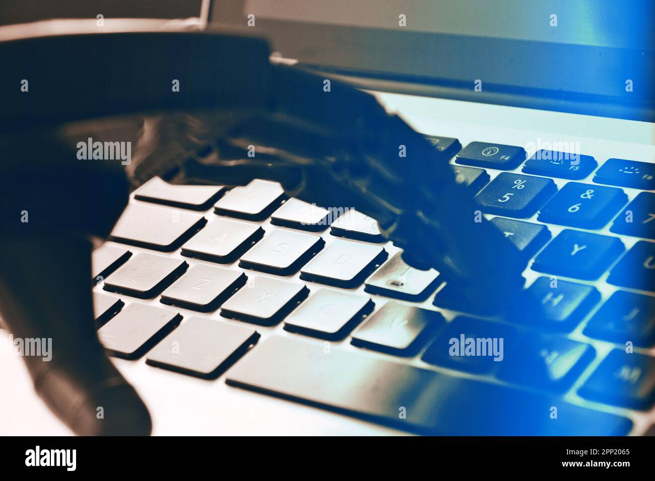 Robotic hand typing on a keyboard . Concept of future and AI Stock ...