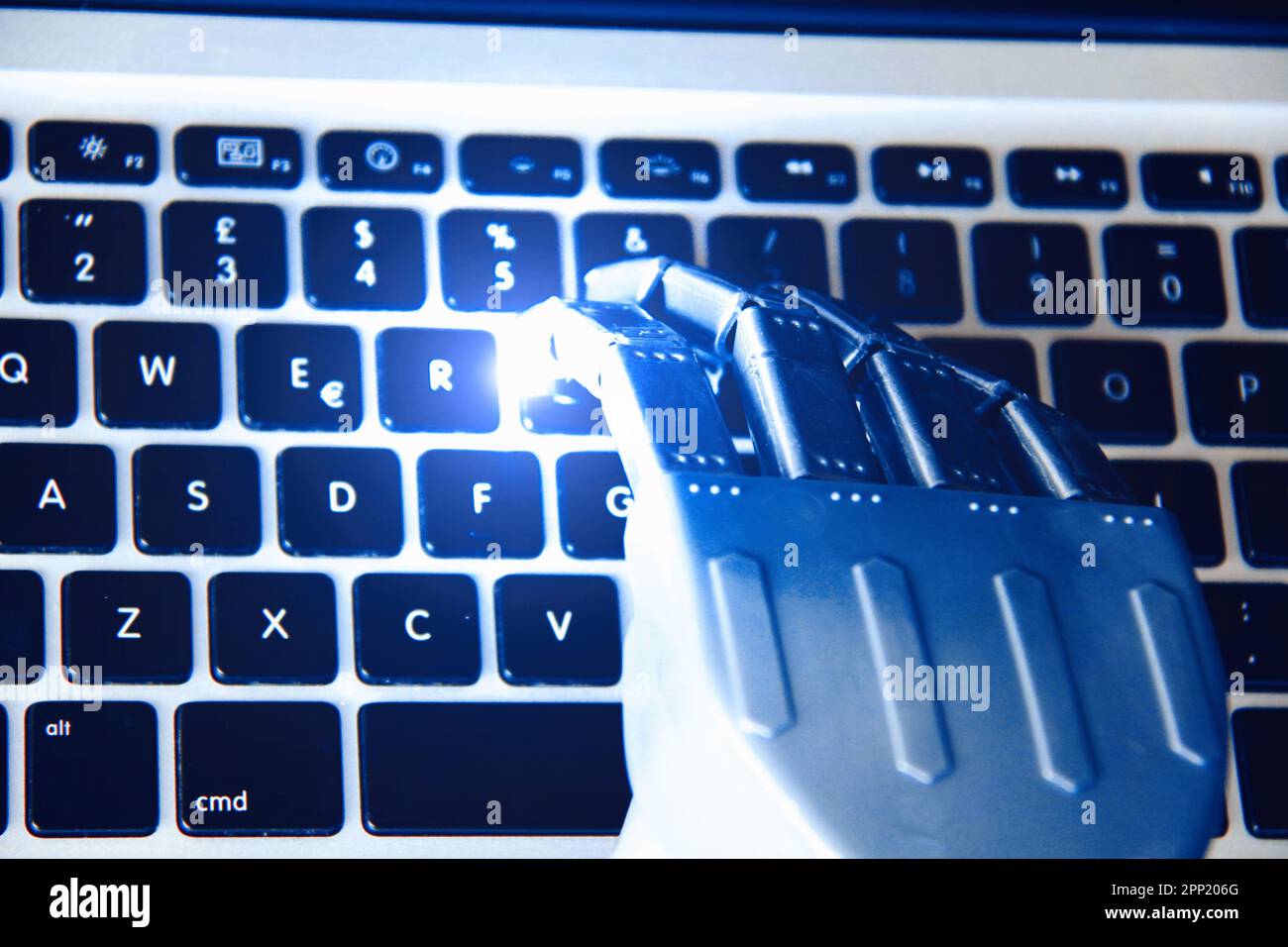 Robotic hand typing on a keyboard . Concept of future and AI Stock ...