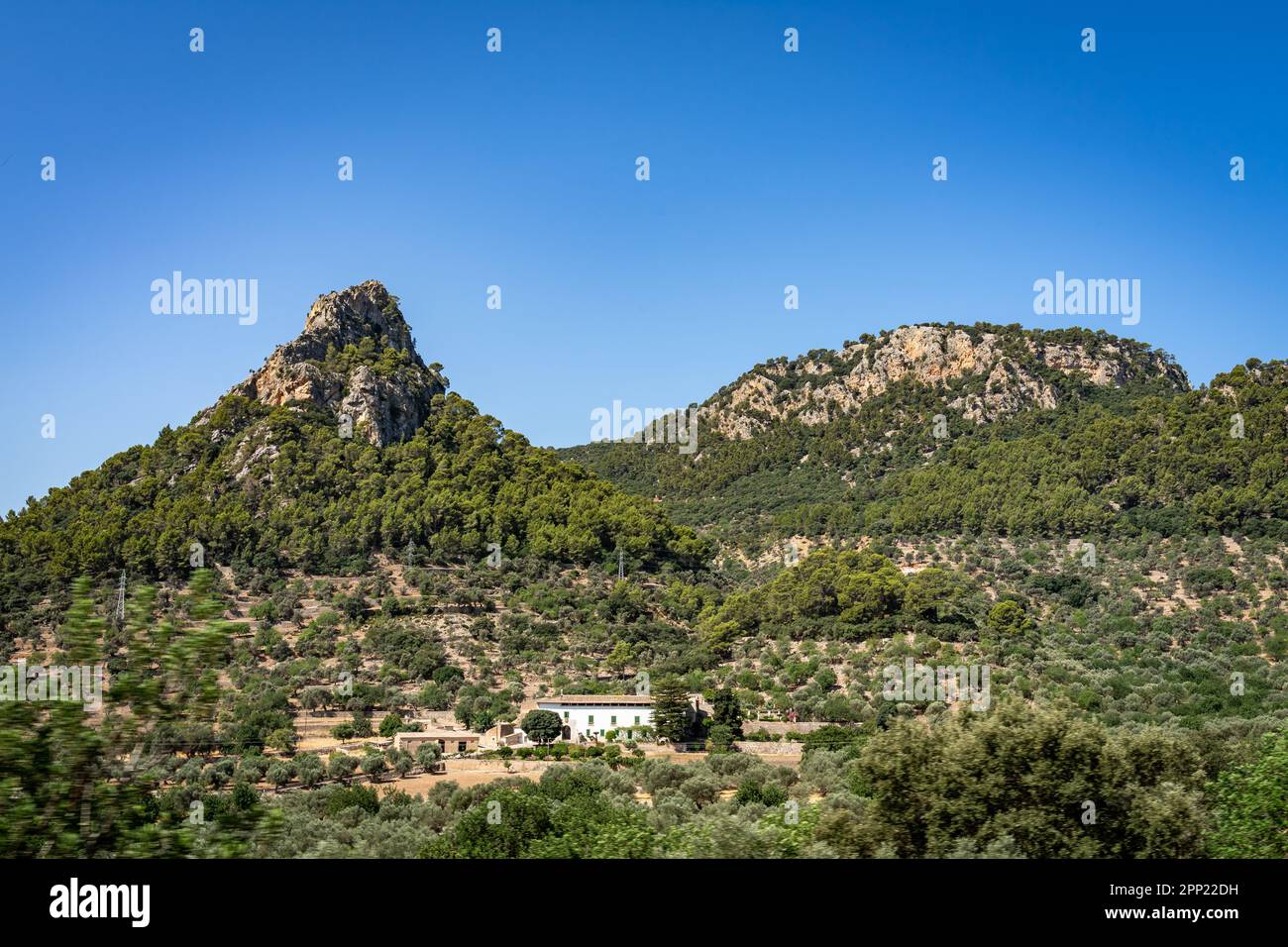 Farm nestled between two hills in Tramuntana Mountains, Mallorca Stock ...