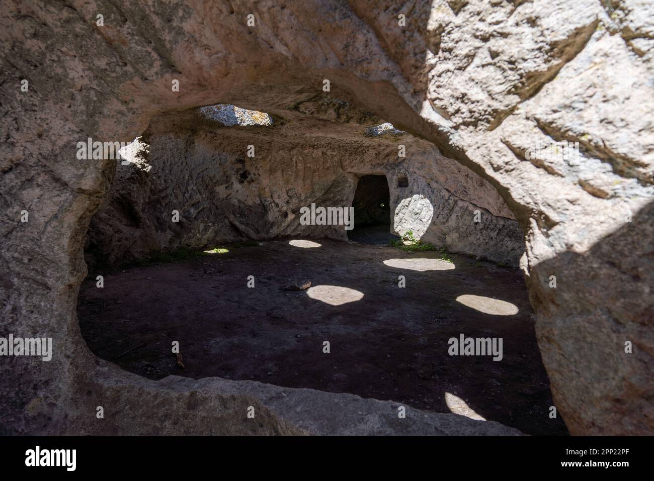 Ancient cave city. Inside the cave, view from the window Stock Photo ...