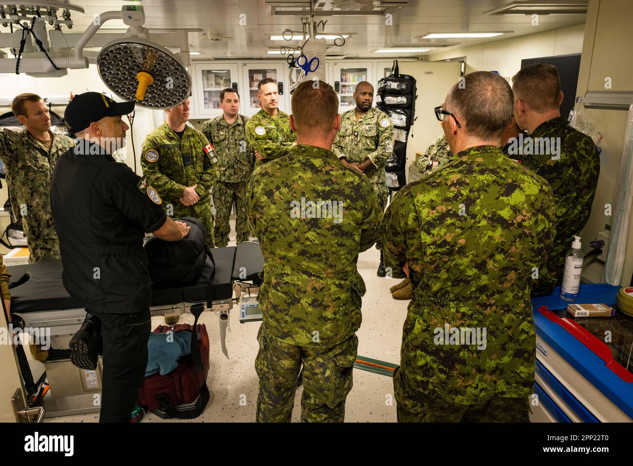 Canadian and American medical staff attend training in the medical bay ...