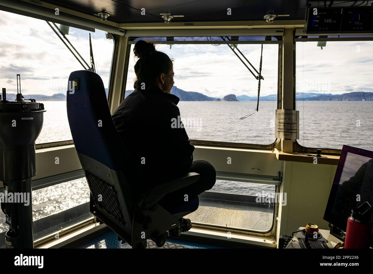 Commander Nicole Robichaud on the bridge of HMCS Margaret Brooke during ...