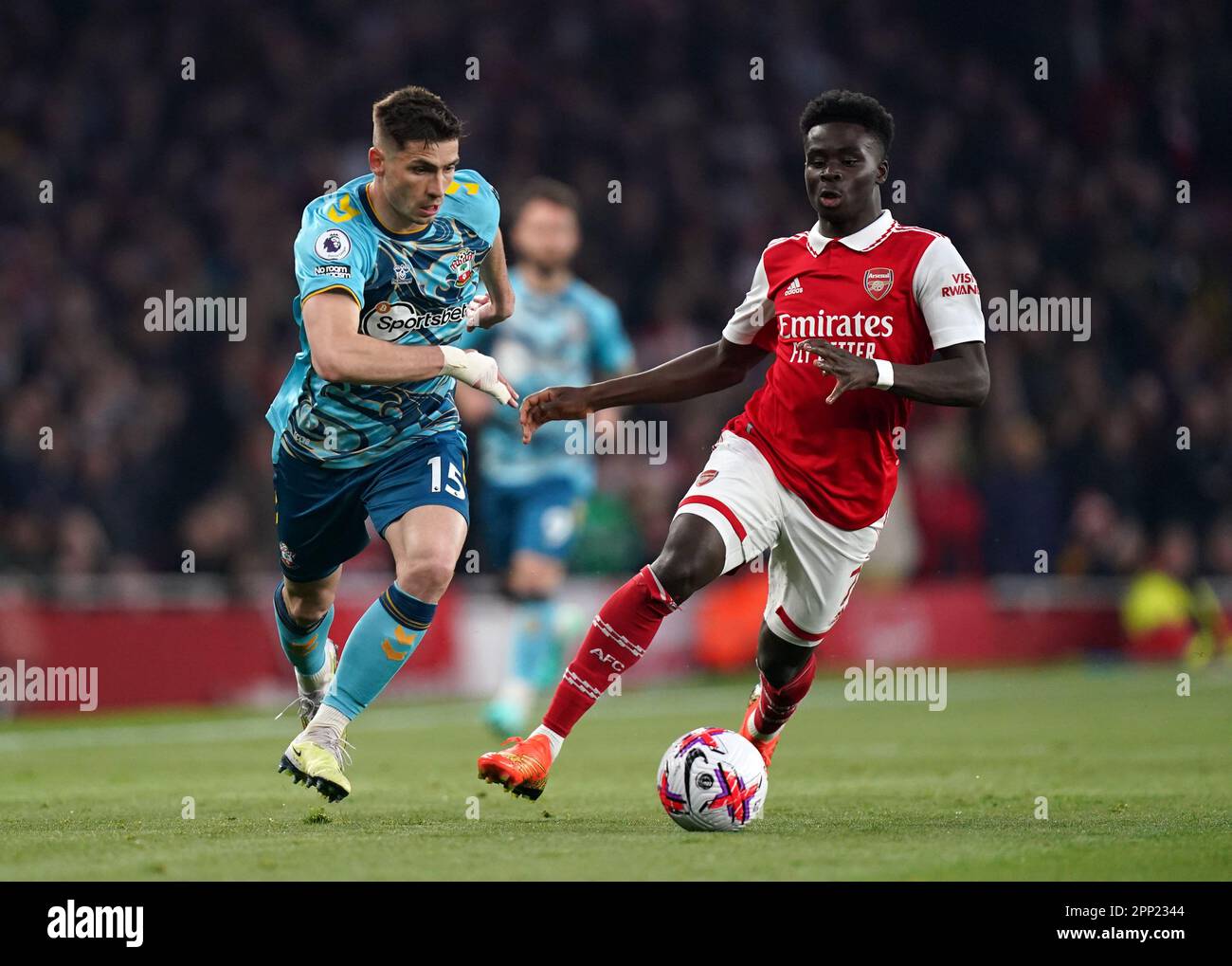 Southampton's Romain Perraud (left) and Arsenal's Bukayo Saka battle ...