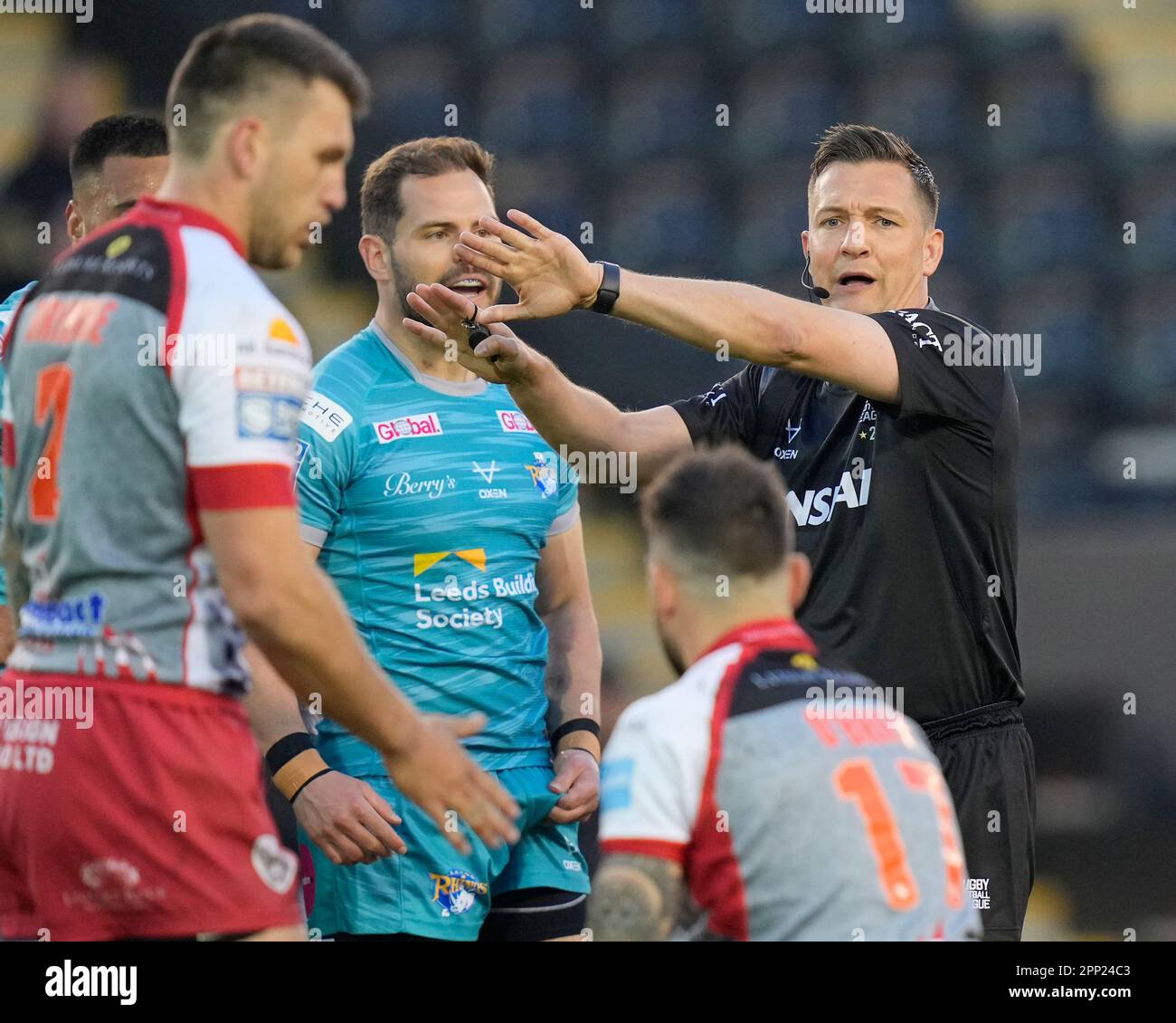 Leigh, UK. 21st Apr, 2023. Referee Mr Ben Thaler indicates a knock-on ...