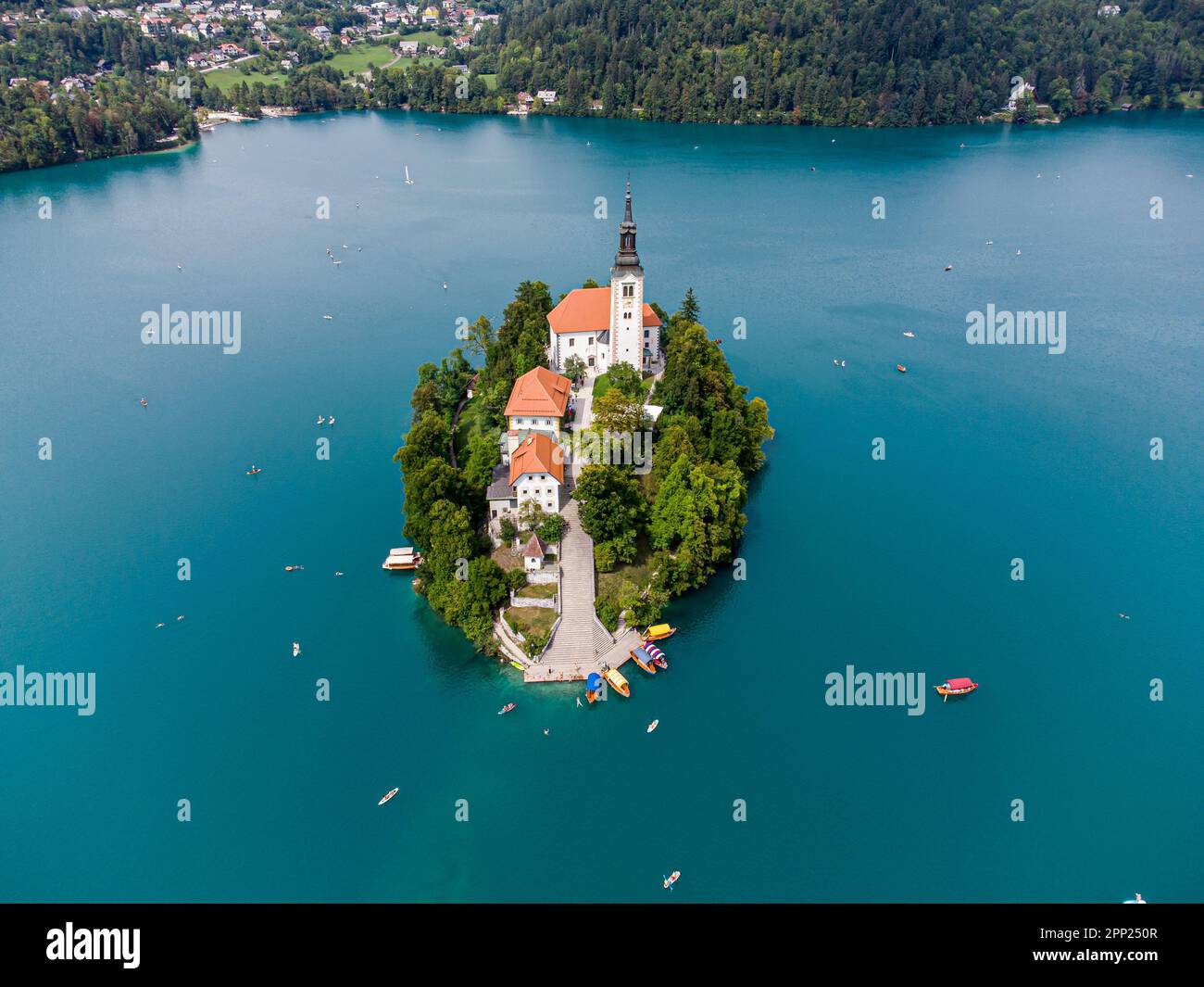 Beautiful idyllic aerial view on island, castle, catholic Maria church ...