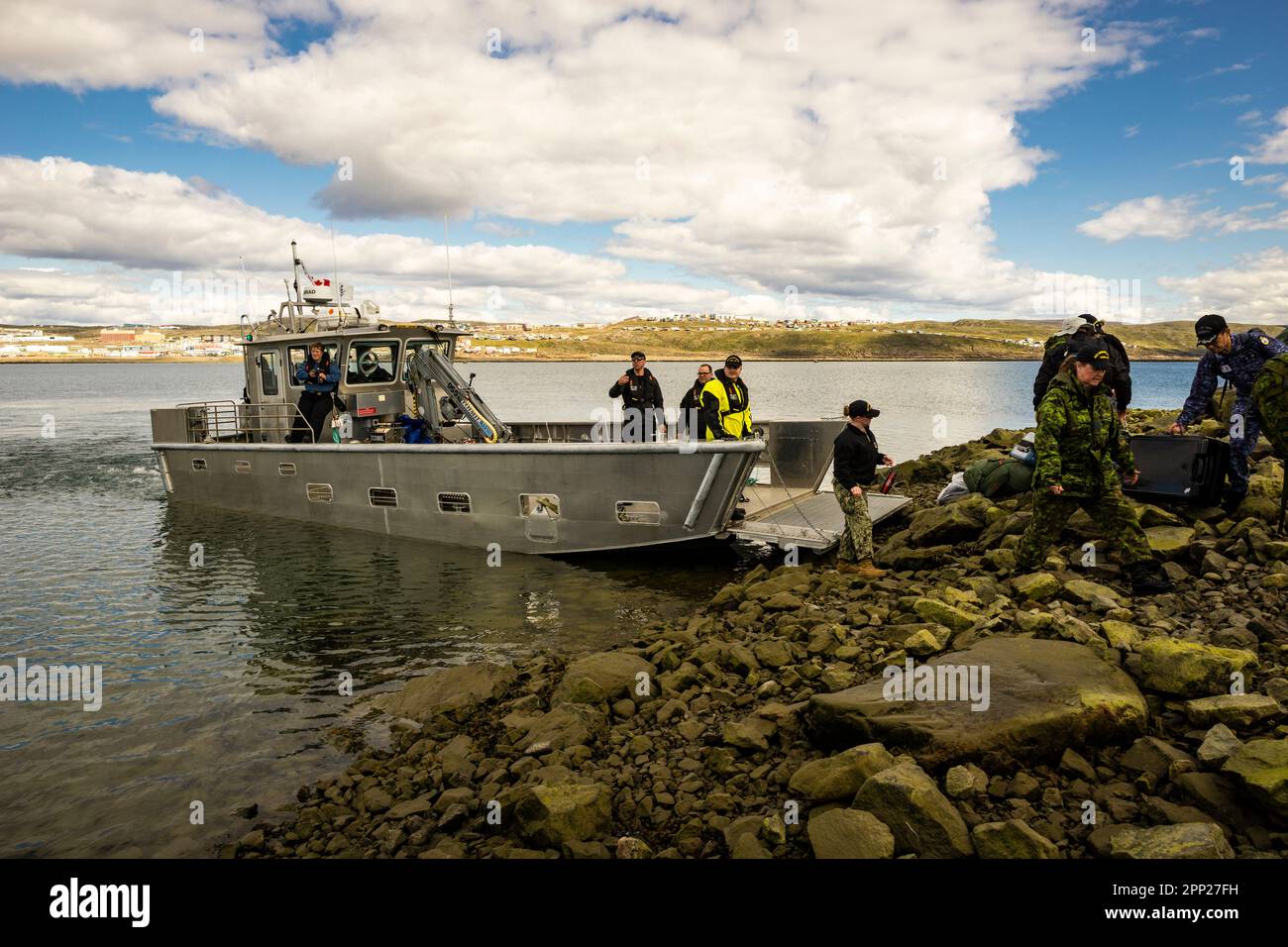 Landing craft embarked in HMCS Margaret Brooke transfers crew ashore at ...