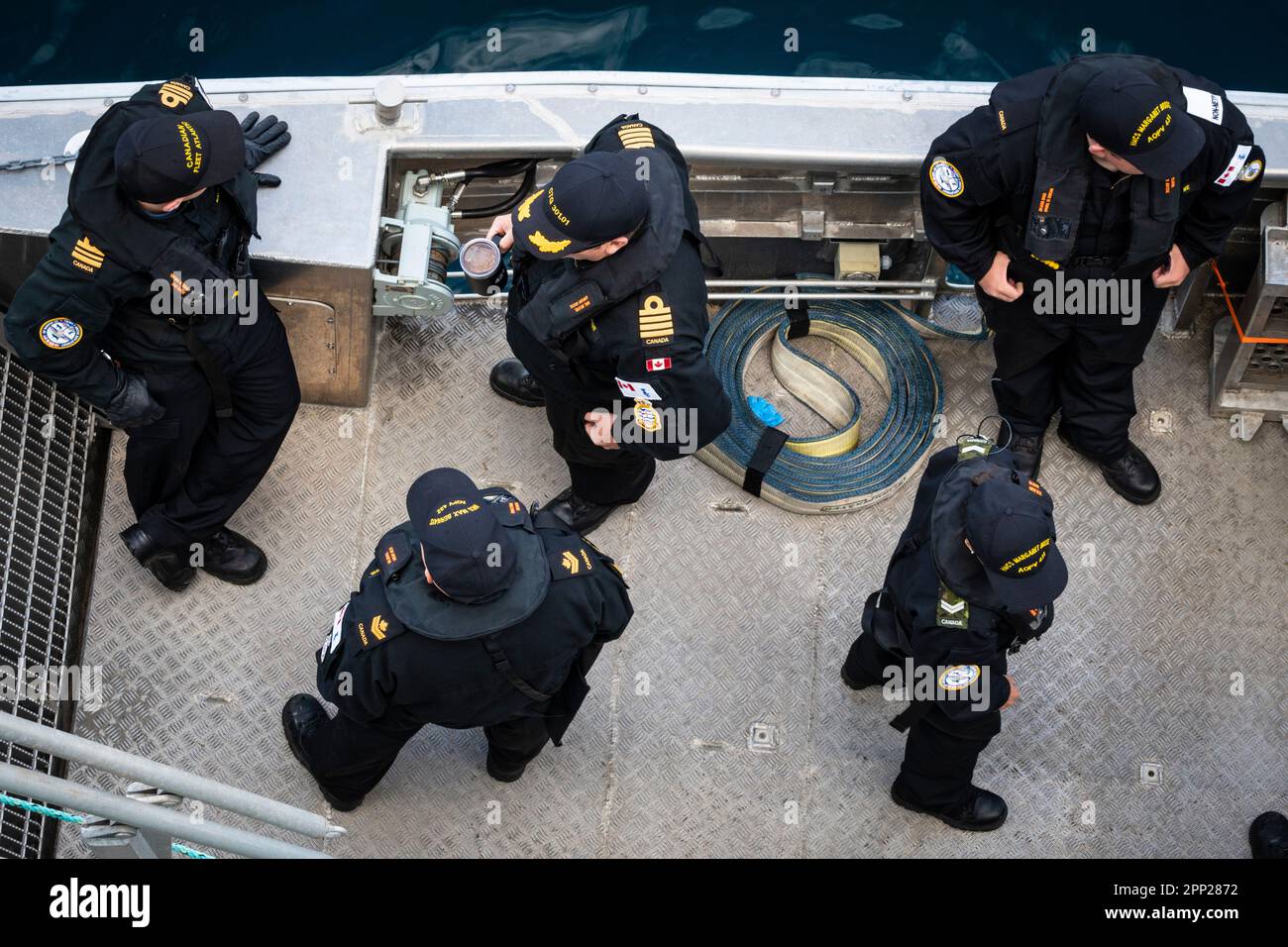 Landing craft embarked in HMCS Margaret Brooke transfers crew ashore at ...