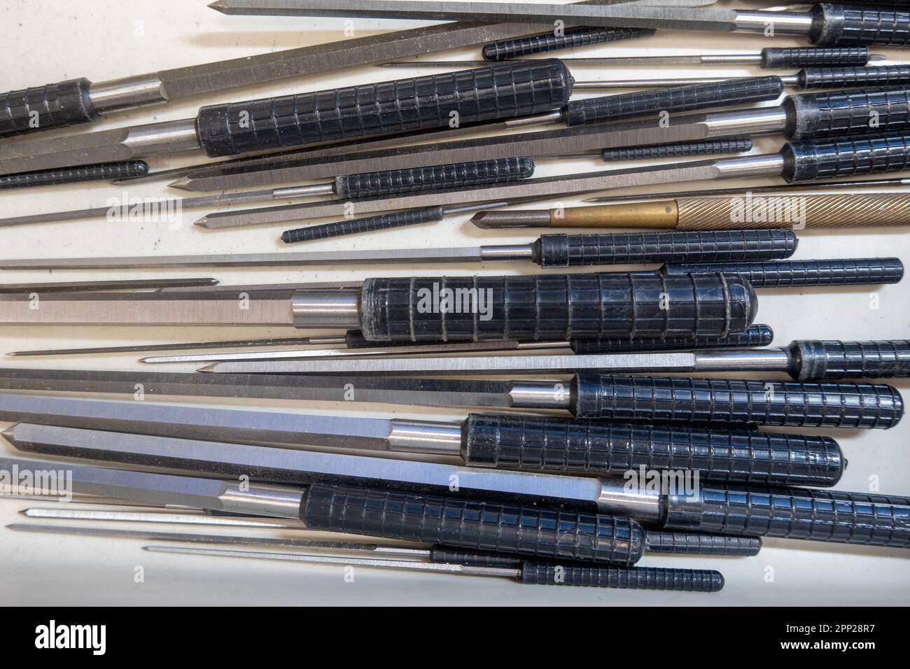 A variety of tools neatly arranged on a workbench Stock Photo - Alamy