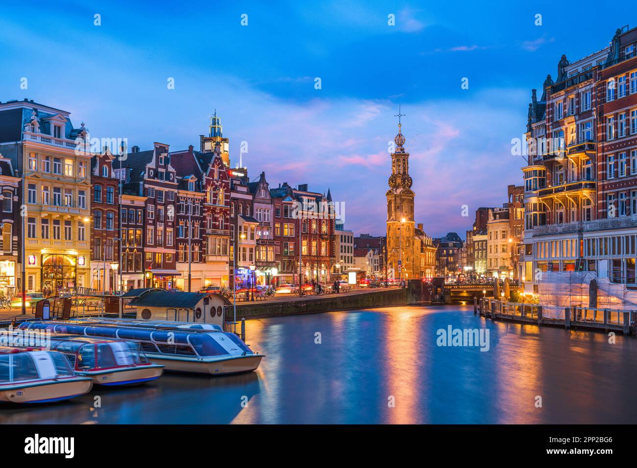 Amsterdam, Netherlands cityscape on the canals at twilight with ...