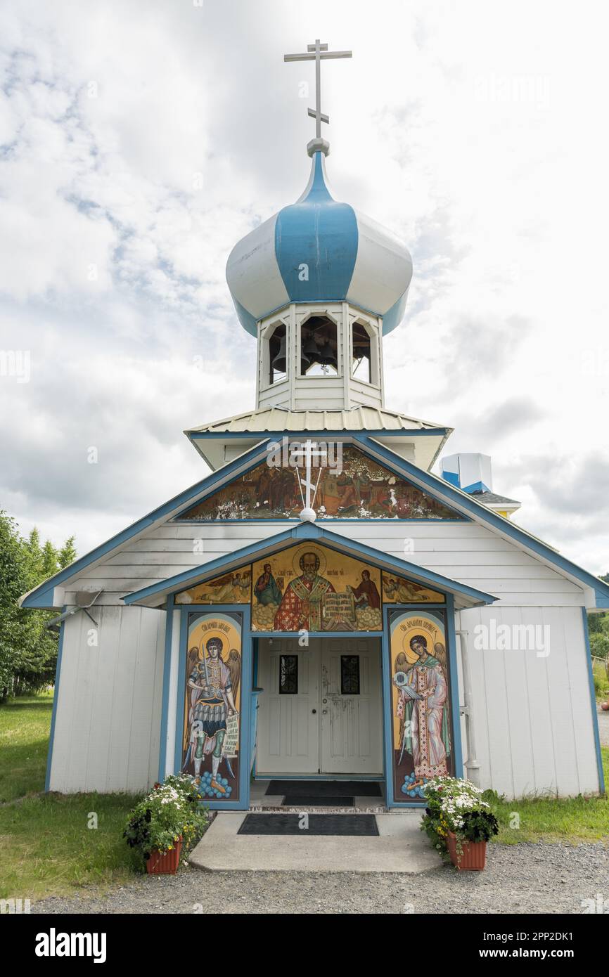The blue and white striped onion dome and ornate entrance of Saint ...